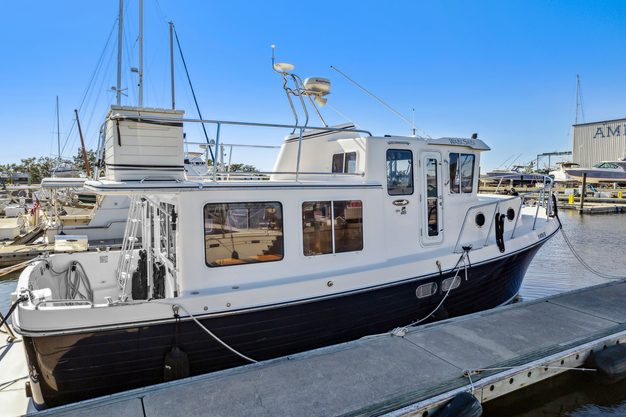 WabiSabi is a 2003 American Tug 34, hull number 48, (its really a 36 ft ...
